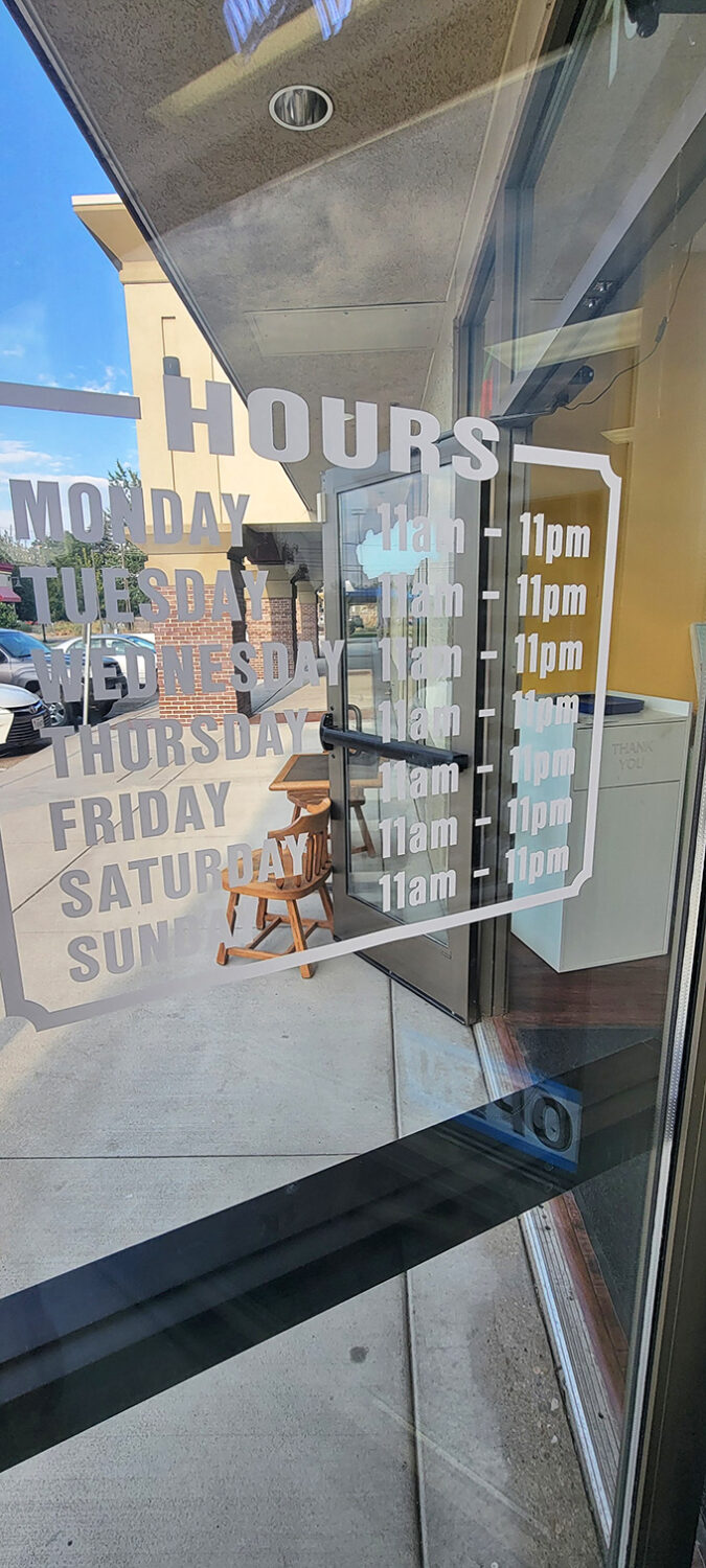 Hours posted like a friendly invitation. The universe is telling you there's plenty of time to fit Mo Berries into your schedule.