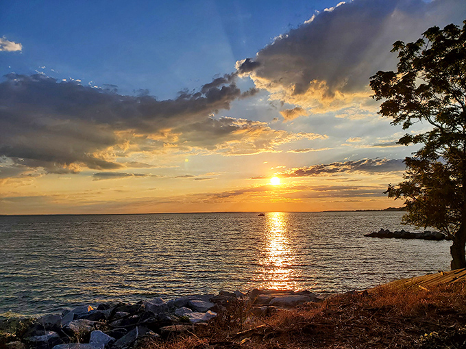 As the sun bids farewell over the Potomac, it paints the sky in colors that would make even the most jaded traveler pause in wonder.