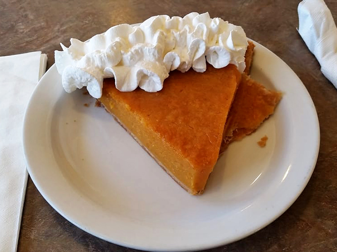 Sweet potato pie topped with whipped cream&mdash;the dessert equivalent of a warm hug from someone who genuinely wants you to be happy.