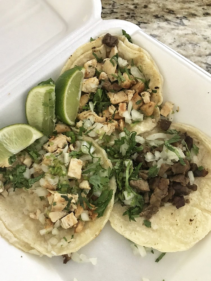 Street tacos in their purest form: double-stacked corn tortillas, perfectly seasoned meat, fresh cilantro, onion, and lime. Simplicity that speaks volumes.