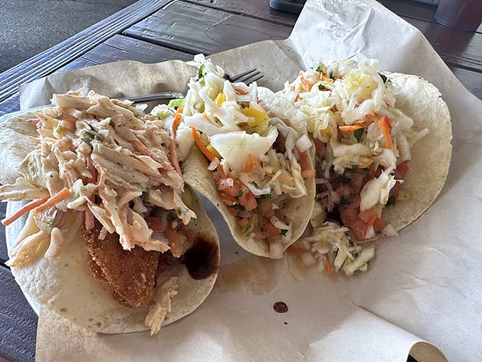 Tacos reimagined through a smoke-infused lens. The slaw adds crunch to each bite like nature's perfect punctuation mark.