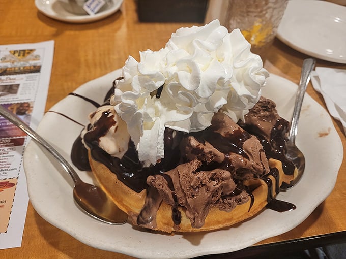 The Belgian waffle sundae &ndash; where breakfast and dessert collide in a magnificent tower of sweet rebellion. 