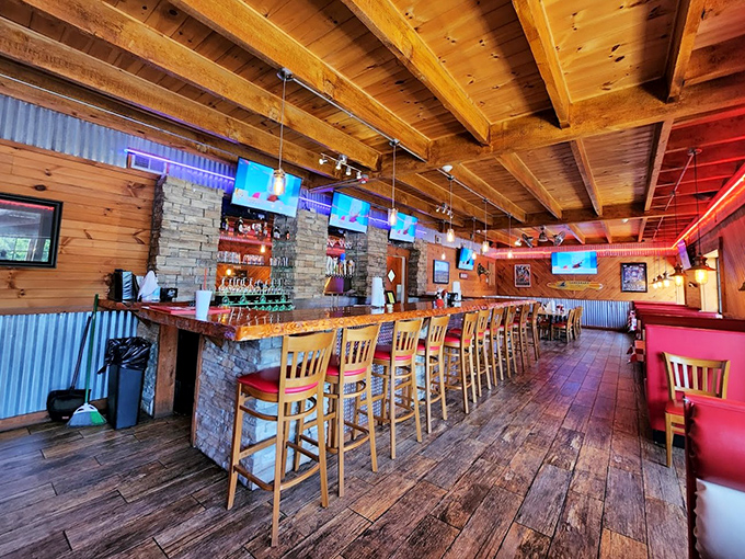 The bar area doesn't just serve drinks&mdash;it creates community. Wood, stone, and the promise of cold beverages make this the perfect barbecue basecamp.