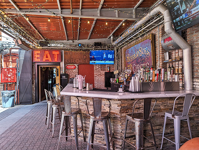 This isn't just a bar&mdash;it's command central for beverage operations. The "EAT" sign offers the simplest, most profound advice you'll receive all day.