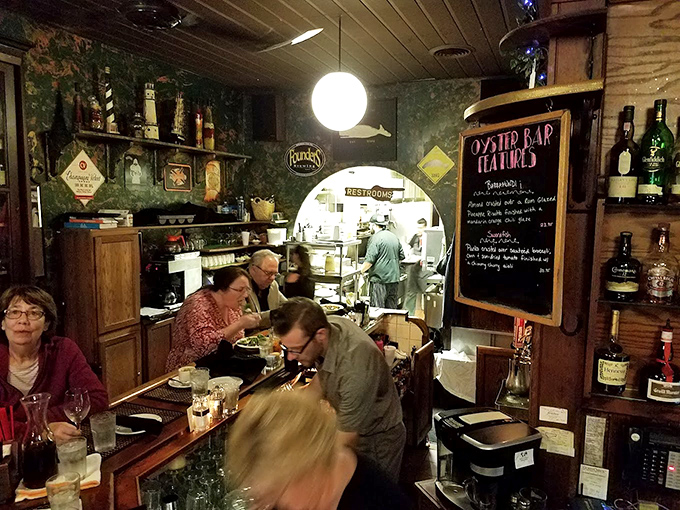 The bar area hums with conversation and anticipation &ndash; that magical space where strangers become friends and regular customers are treated like family members who actually get along.