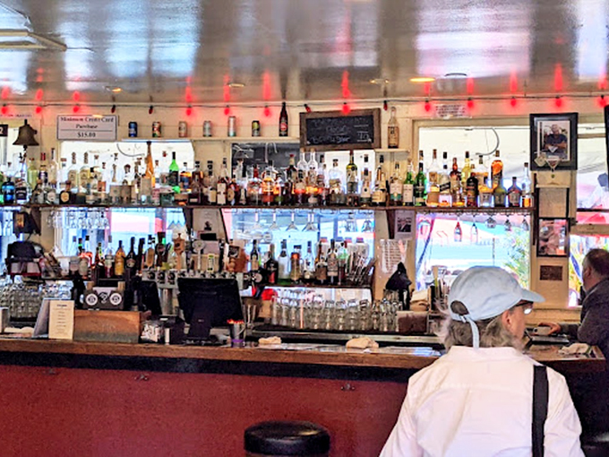 A well-stocked bar ready to provide liquid courage for those tough decisions like "Should I order a second round of crab cakes?" (Spoiler: Yes, you should.)
