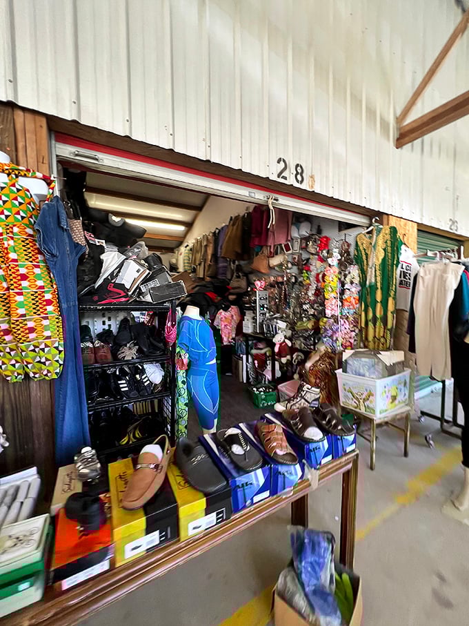 Booth 28 demonstrates the flea market golden rule: if you can hang it, stack it, or balance it, you can sell it.