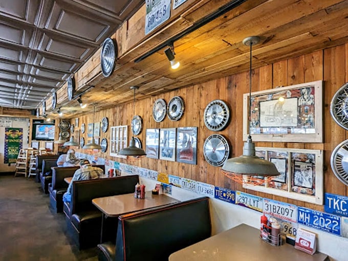 License plates and hubcaps line the walls&mdash;because great barbecue is always worth the drive. Each booth holds stories of sauce-stained satisfaction.