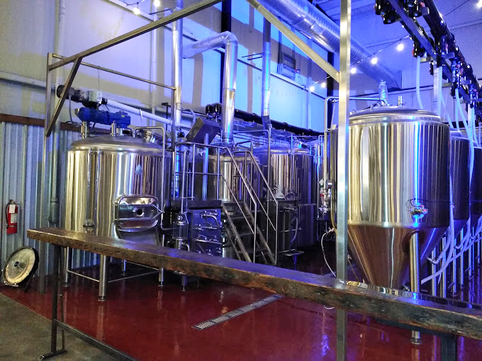 The gleaming cathedral of beer creation. These stainless steel vessels are where science and magic collaborate to delicious effect.