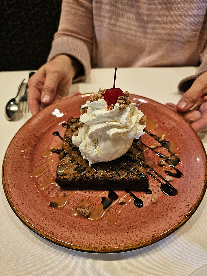That brownie isn't dessert&mdash;it's a chocolate revelation topped with a cloud of whipped cream that makes dieting tomorrow's problem, not tonight's.