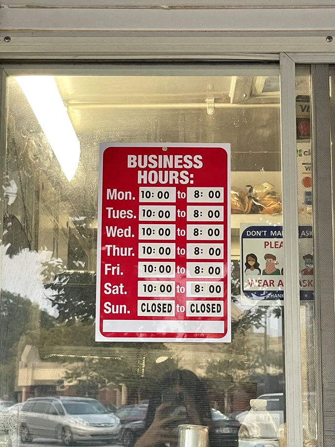 The hours of operation sign might as well read: "Times when happiness is available." Closed Sundays because even culinary magicians need rest.