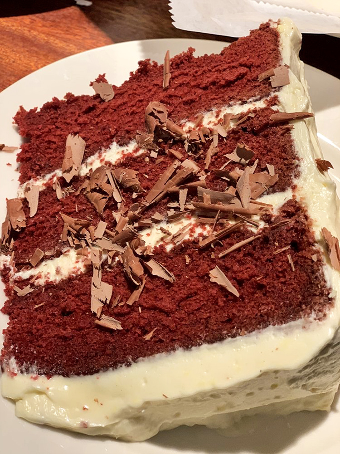 Red velvet cake that doesn't just end a meal&mdash;it provides closure with the kind of frosting that makes grown adults lick their forks.
