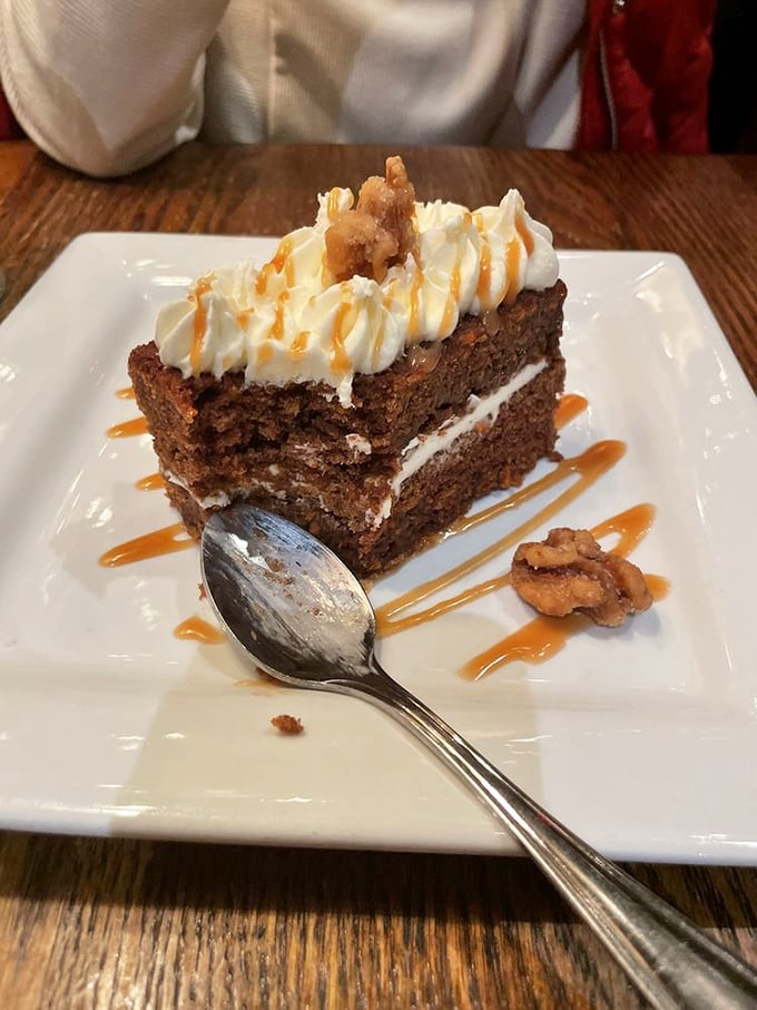 Carrot cake that makes vegetables feel like they've finally made it to the big time. That caramel drizzle is the standing ovation they deserve.