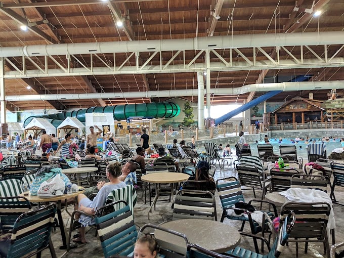 The strategic parent zone &ndash; where vigilant guardians maintain sightlines to multiple attractions while calculating exactly how many more hours until acceptable pizza-ordering time.