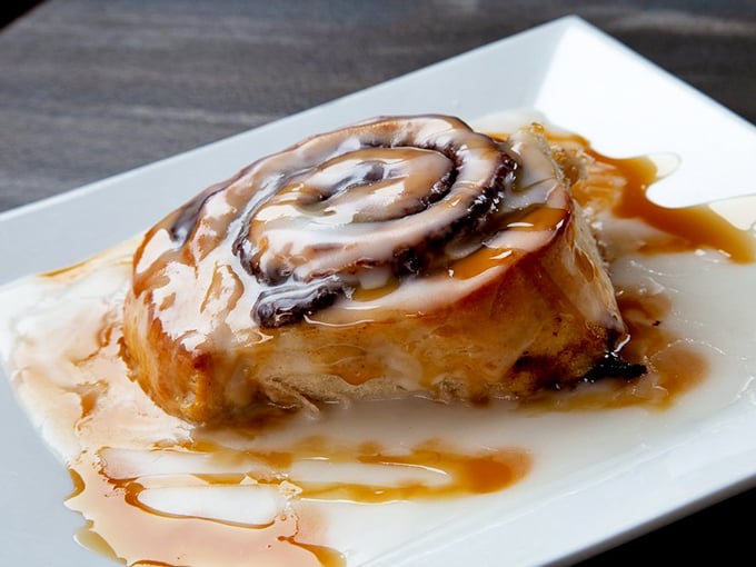 This cinnamon roll isn't just dessert&mdash;it's therapy on a plate, with icing that flows like all your worries melting away.