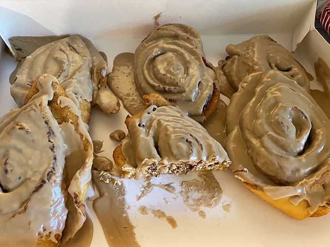 Cinnamon rolls the size of your face, glazed with enough sweetness to make Monday mornings bearable. Worth every sticky finger.