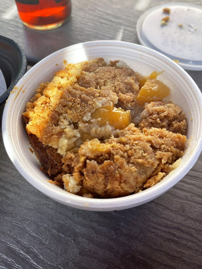 The cobbler that whispers "save room for dessert." Warm fruit, buttery crumble, and a hint of cinnamon create the perfect finale to a barbecue symphony.