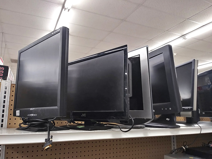 Computer monitors lined up like expectant job applicants. "Pick me! I still have at least five good years left in these pixels!" 