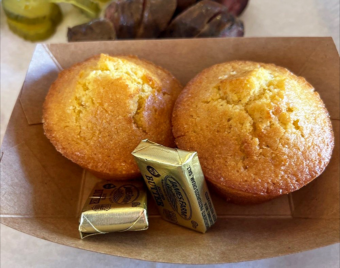 Cornbread: the sweet counterpoint to smoky barbecue intensity. These golden muffins aren't just sides&mdash;they're essential supporting actors in the barbecue drama.