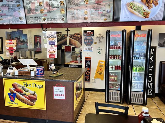The counter where dreams come true. Vienna Beef signs and Chicago memorabilia remind you this isn't just food&mdash;it's cultural heritage on a bun.