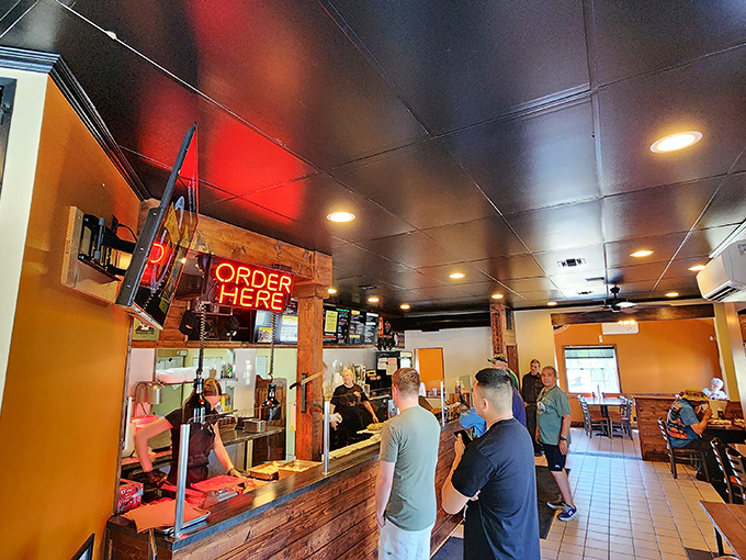 The moment of anticipation: customers at the counter, about to make decisions that will impact their immediate happiness and possibly their need for a nap afterward.