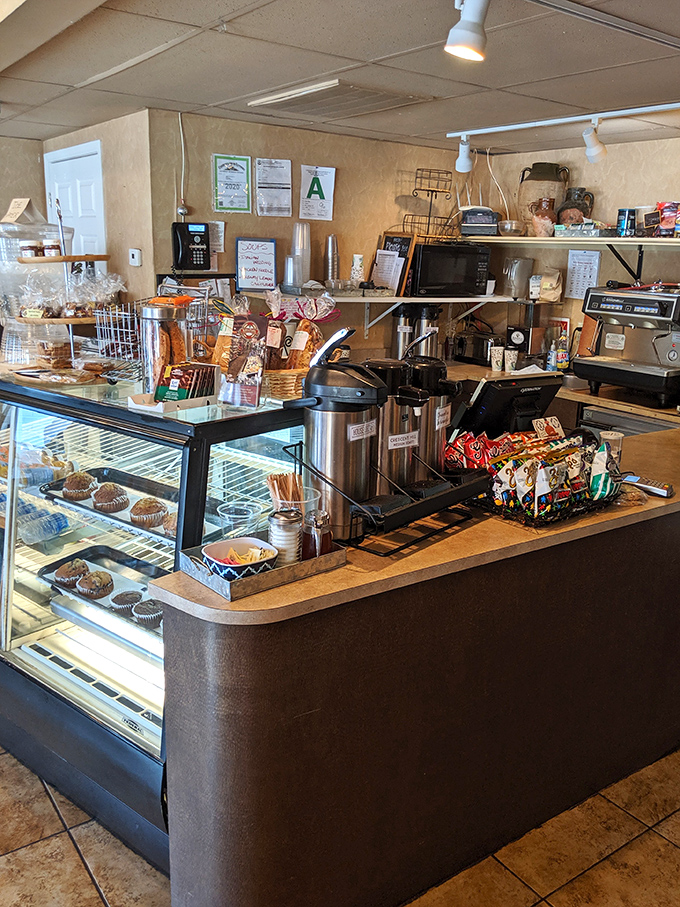 The counter where decisions are made and appetites are teased. Those pastry cases aren't just displays&mdash;they're windows into a sweeter world.