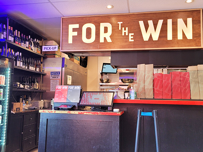 The wooden counter complemented by hanging plants creates that California vibe: casual yet intentional, like wearing flip-flops to a really nice restaurant.