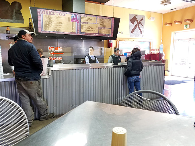 Where the magic happens. The corrugated metal counter separates you from burrito paradise, but only temporarily. Patience here is always rewarded.