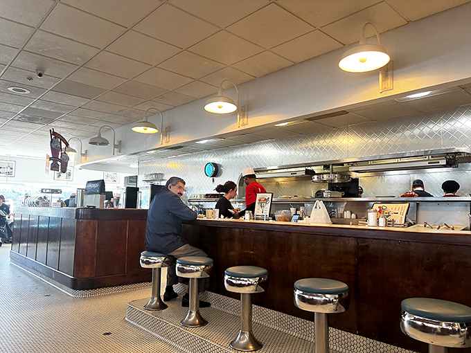 Where coffee refills flow freely and the rhythm of spatulas on the grill provides the soundtrack to a perfect Kansas morning.