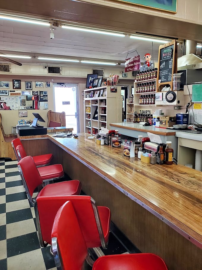 The counter where BBQ dreams come true. Those red stools have supported generations of happy eaters&mdash;and they're ready for you next.