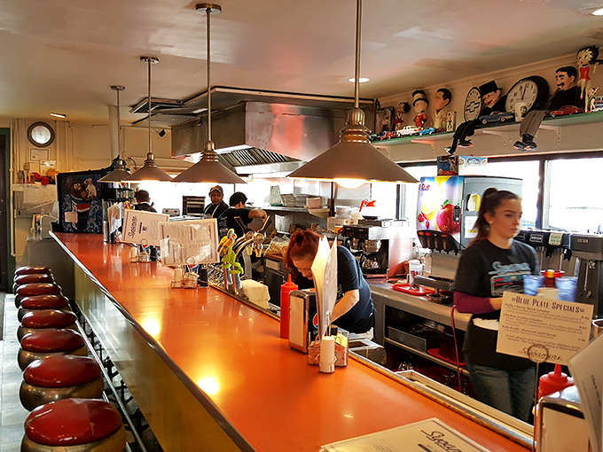 The counter where magic happens&mdash;where strangers become regulars, and where every order is prepared with practiced precision and pride.