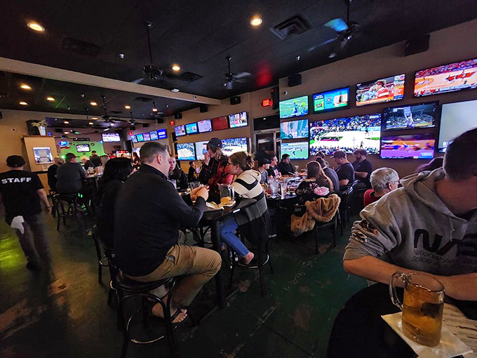 The true measure of a great sports bar – happy patrons with eyes darting between plates of food and screens of action.