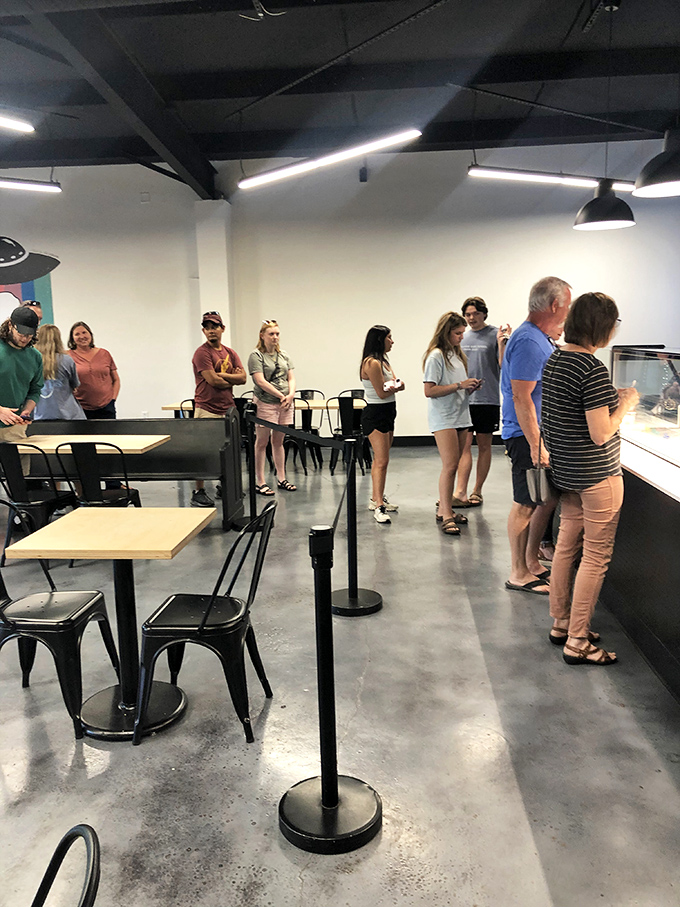 The line forms as devotees await their frozen fix. Some pilgrimages involve mountains; others involve handcrafted Mississippi ice cream. Both are spiritual journeys. 