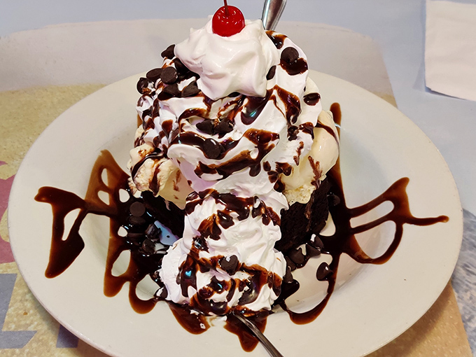 Not so much a dessert as an engineering marvel of ice cream, whipped cream, and chocolate. Spoons required, sharing optional.