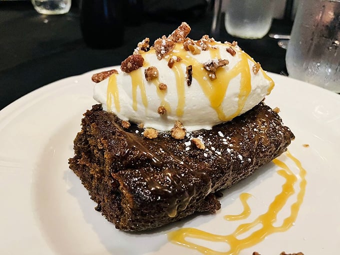 Dessert that demands to be photographed before devoured. This chocolate creation topped with ice cream and caramel is the grand finale your taste buds deserve. 