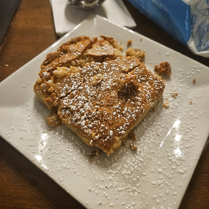 A humble square of homemade dessert dusted with powdered sugar&mdash;the sweet punctuation mark at the end of an Italian-American love letter.
