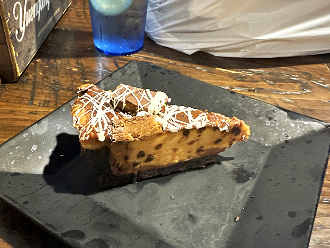 Even the desserts refuse to be reasonable at Denny's. This slice of pie looks innocent until you realize it's plotting against your belt.