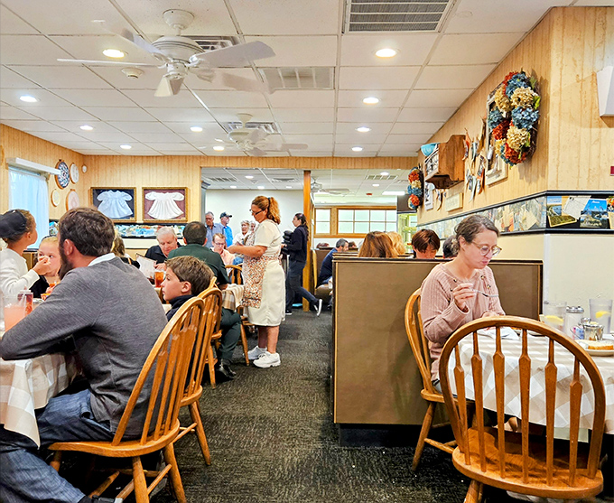 A dining room filled with happy faces and empty plates. The universal language of "this food is so good I've forgotten how to speak" is spoken fluently here.