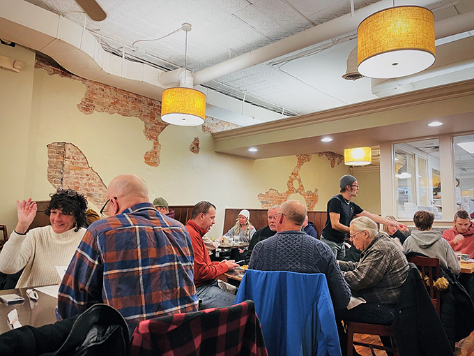 A dining room buzzing with conversation and the symphony of forks meeting plates. Strangers united by the universal language of good food.