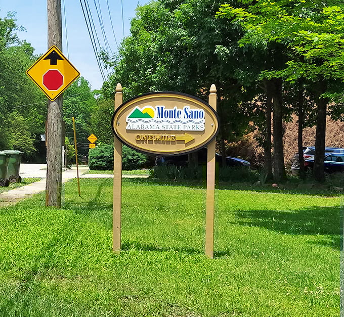 The most welcome sign after hours of highway driving. One mile separates urban hustle from mountain tranquility&mdash;the best commute in Alabama.