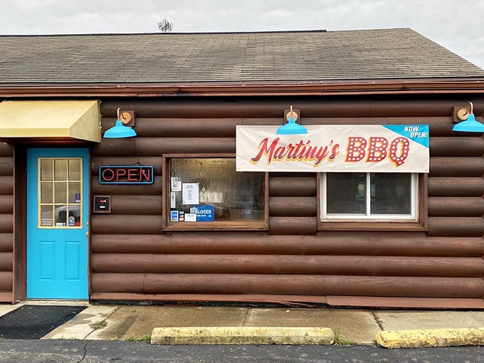 The blue door and "OPEN" sign&mdash;possibly the two most beautiful words and colors when you're craving authentic barbecue.