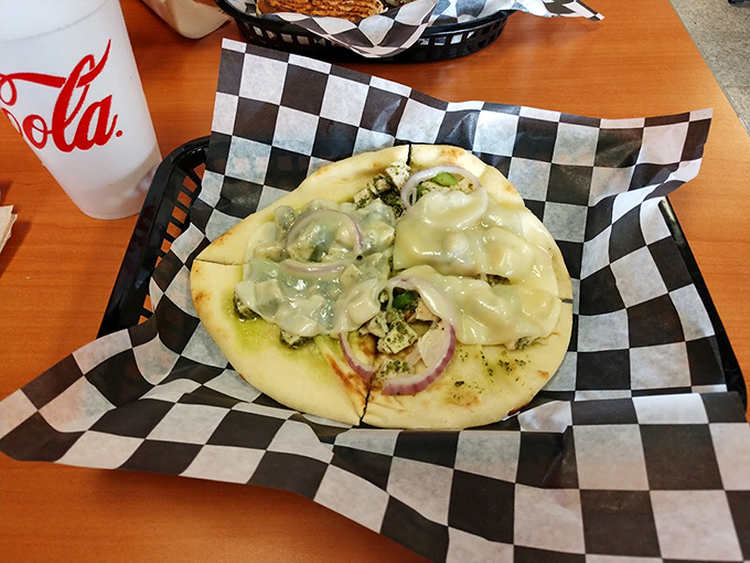 This flatbread pizza proves that thinking outside the bread box yields delicious dividends. Simple ingredients transformed through perfect preparation.