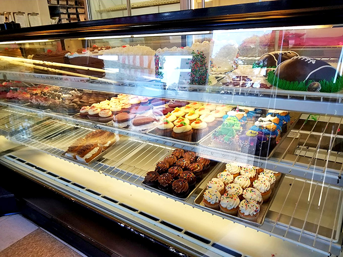 The pastry case&mdash;where willpower goes to die a delicious death. Each shelf a different chapter in the story of "Why I Needed to Buy Stretchy Pants."