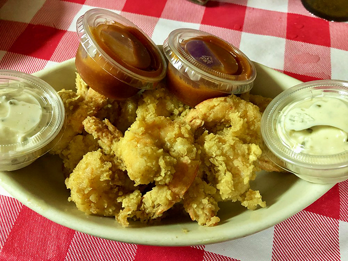 Fried shrimp that crunch like autumn leaves but taste like summer celebrations. The dipping sauces are just showing off at this point. 