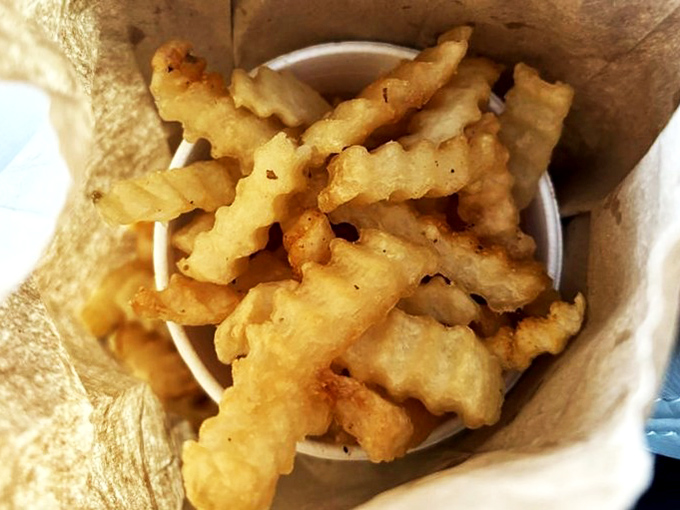 Crinkle-cut fries that crunch like autumn leaves, golden-crisp on the outside and fluffy within&mdash;the perfect sandwich sidekick.