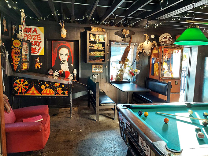 The game room feels like it was designed by someone who couldn't decide between carnival, dive bar, and art gallery&mdash;so they chose "all of the above."