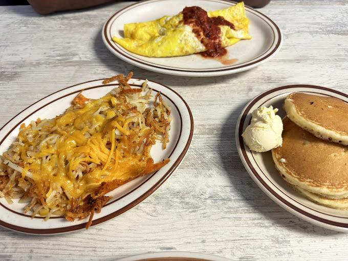 Those hash browns aren't just crispy and cheesy&mdash;they're the supporting actor that steals the show on a plate of breakfast perfection.