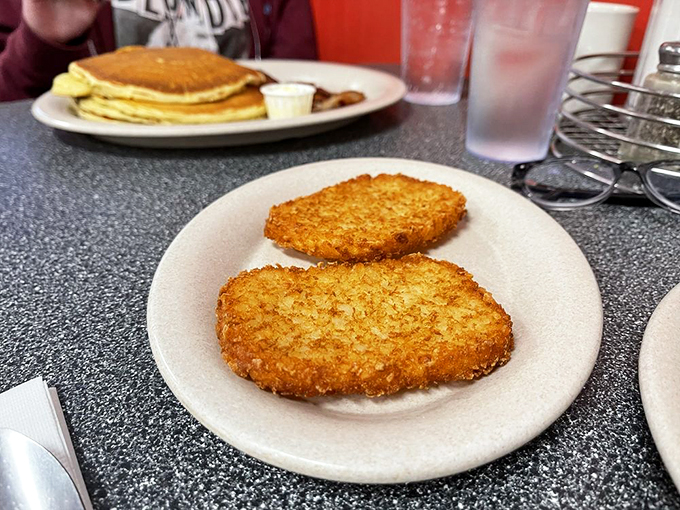 Golden hash browns: the unsung heroes of breakfast. Crispy on the outside, tender inside, and absolutely essential to the experience.