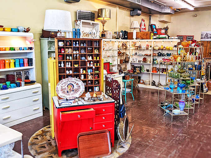 Colorful displays of vintage kitchenware arranged with such care that you'll suddenly need that red cabinet you never knew existed.