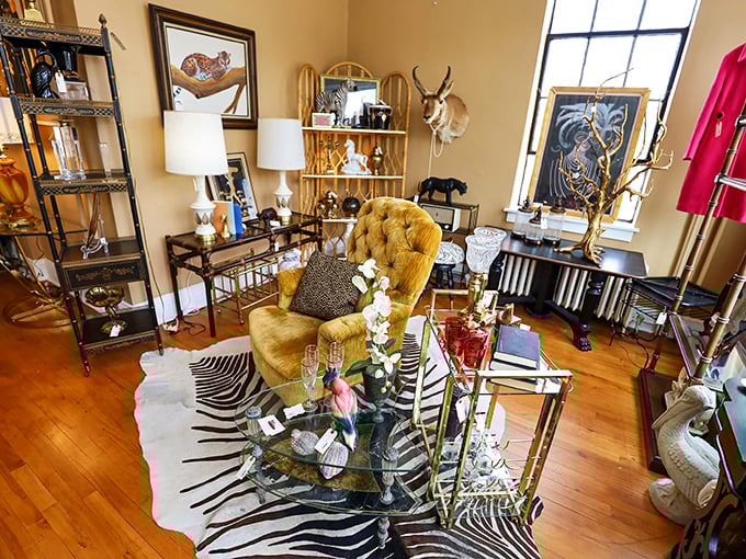 This eclectic living room setup feels like you've stumbled into a glamorous 1970s apartment &ndash; zebra rug and all.